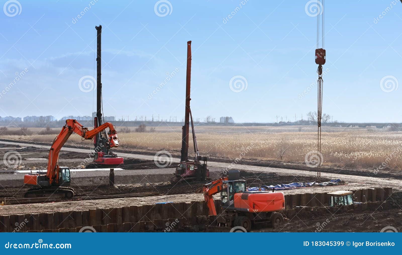 Construction Site with Construction Machines an Excavator and Piling ...