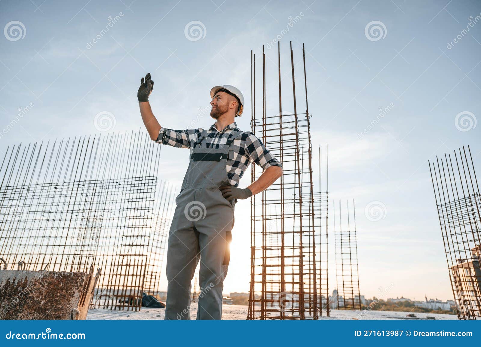 On Construction Site. Man in Grey Uniform is Working Stock Image ...