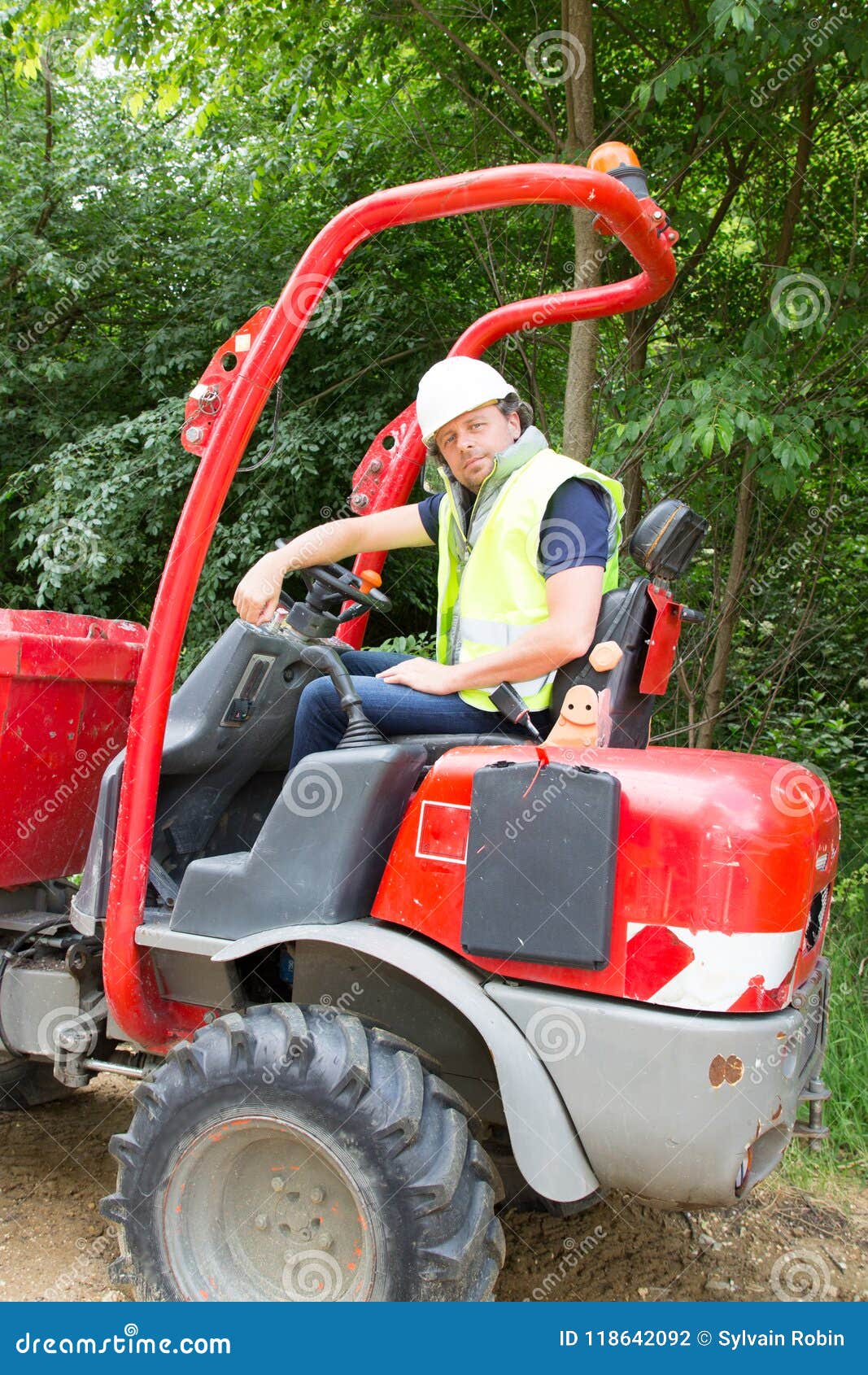 A Construction Site Man Worker Driving Digger Stock Photo - Image of ...