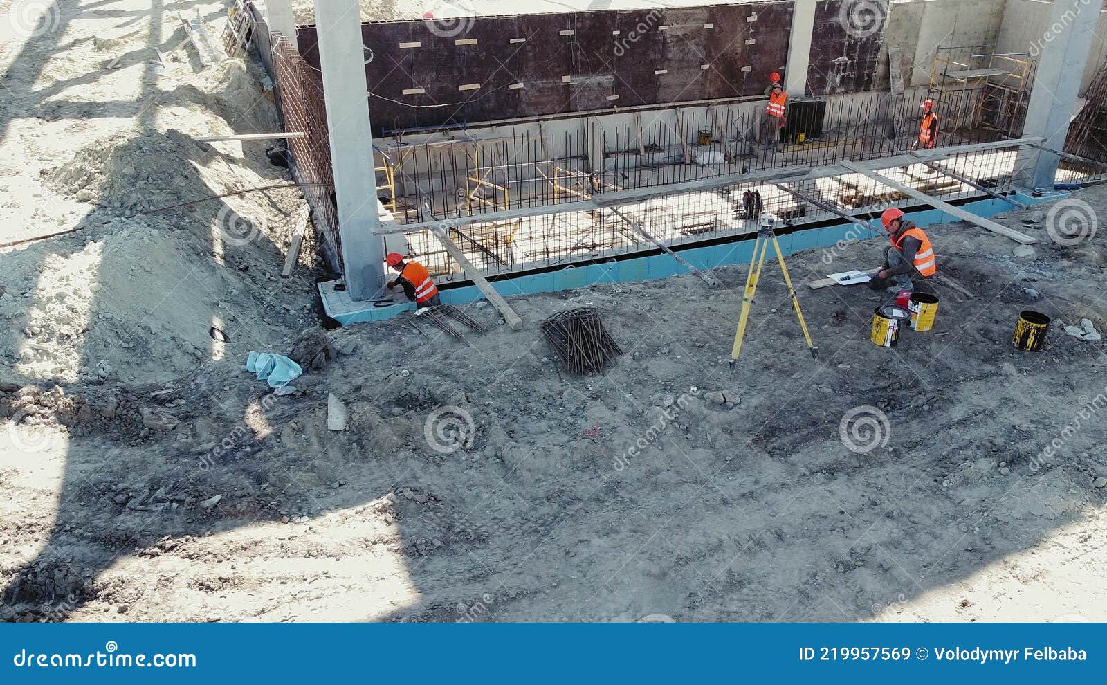 Construction Site Manager Looks at the Floor Plans. View from a Height ...