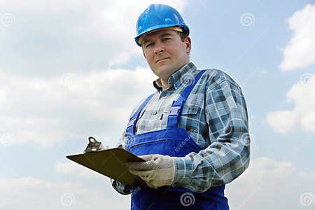 Construction Site Manager with Notepad Stock Photo - Image of notepad ...