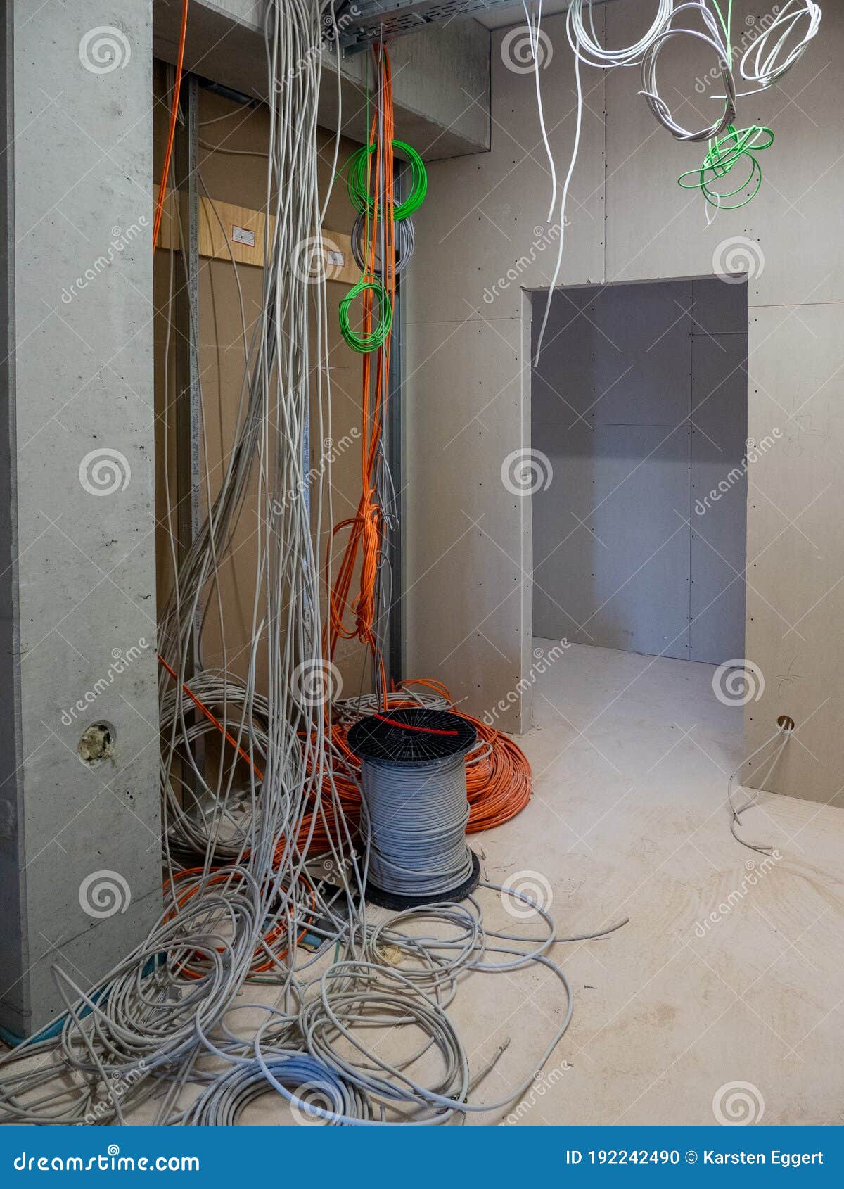 On Construction Site Many Network and Power Cables Hang from the ...