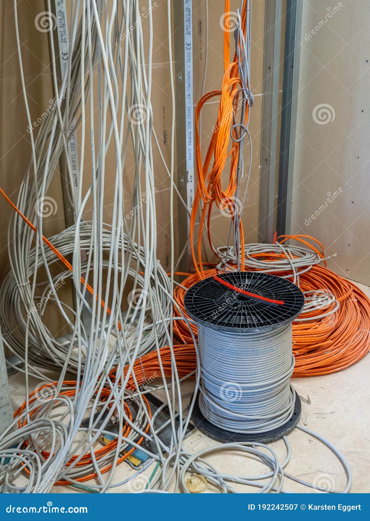 On Construction Site Many Network and Power Cables Hang from the ...