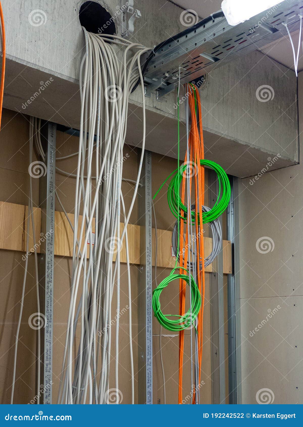 On Construction Site Many Network and Power Cables Hang from the ...