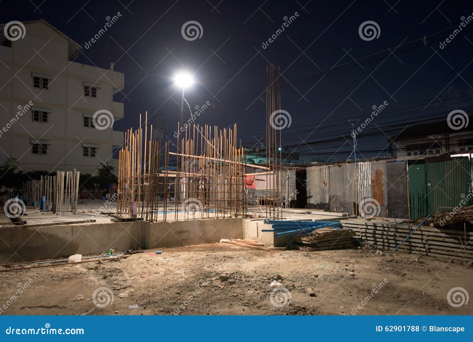 Construction site at night stock photo. Image of business - 62901788