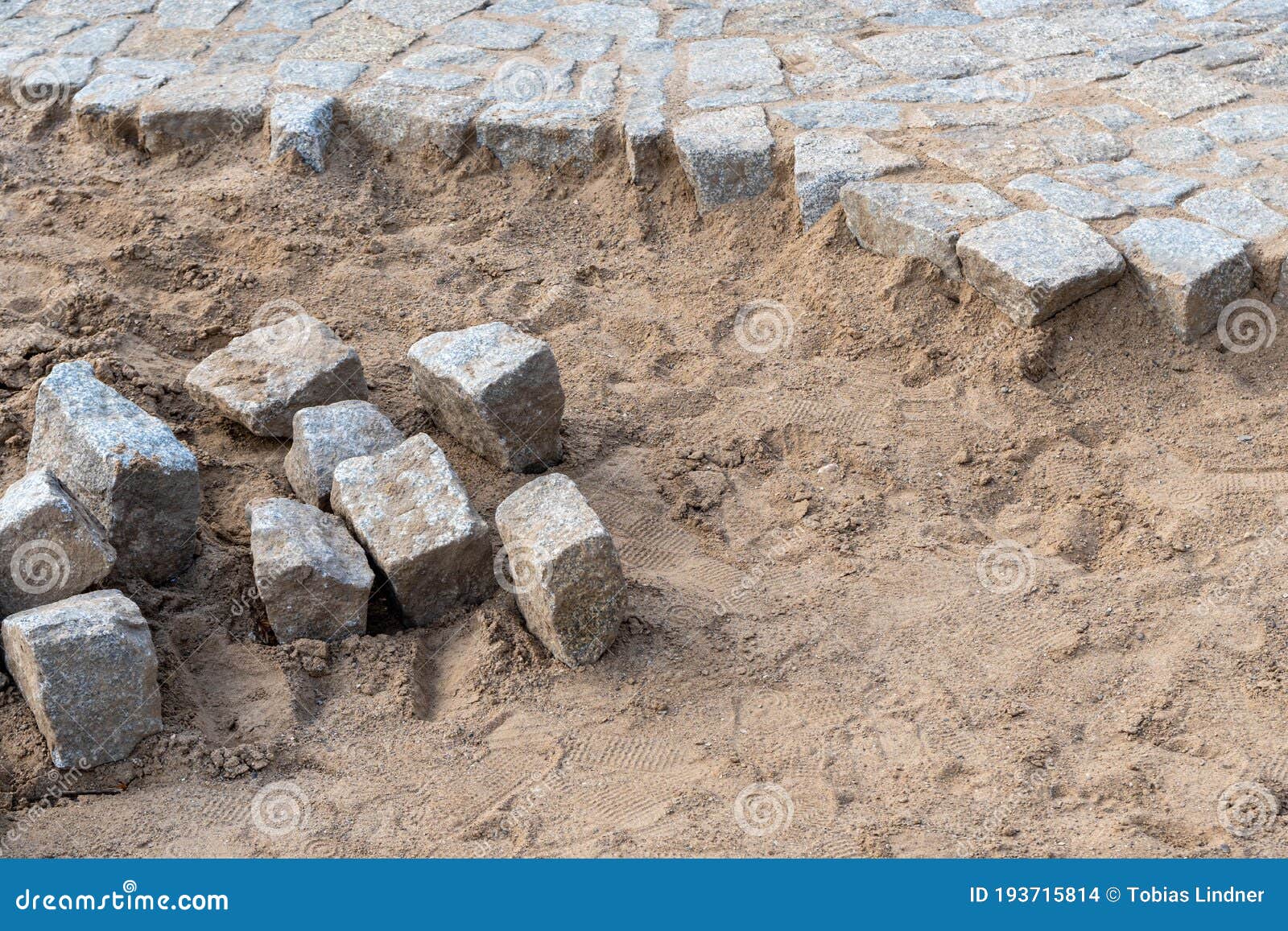 Construction Site of a Pavement, Pile of Stones and Sand Stock Photo ...
