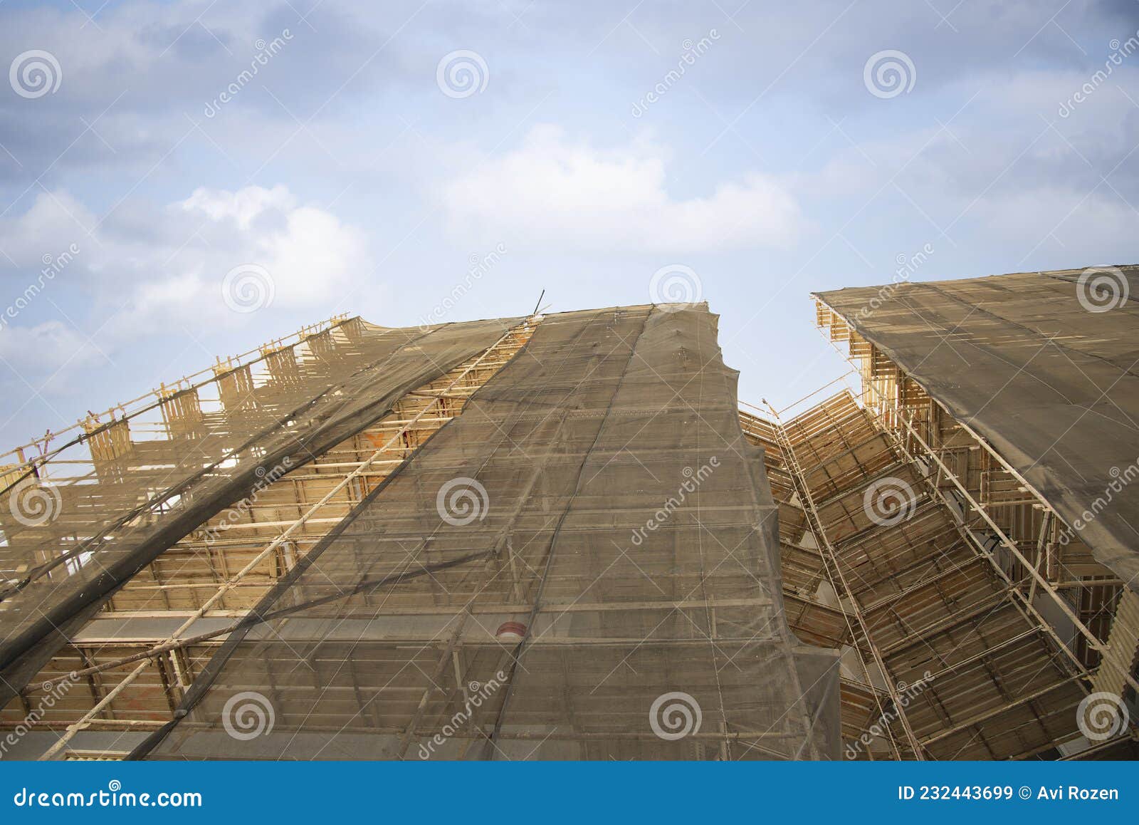 Construction Site with a Protective Safety Net on the Facade of a ...