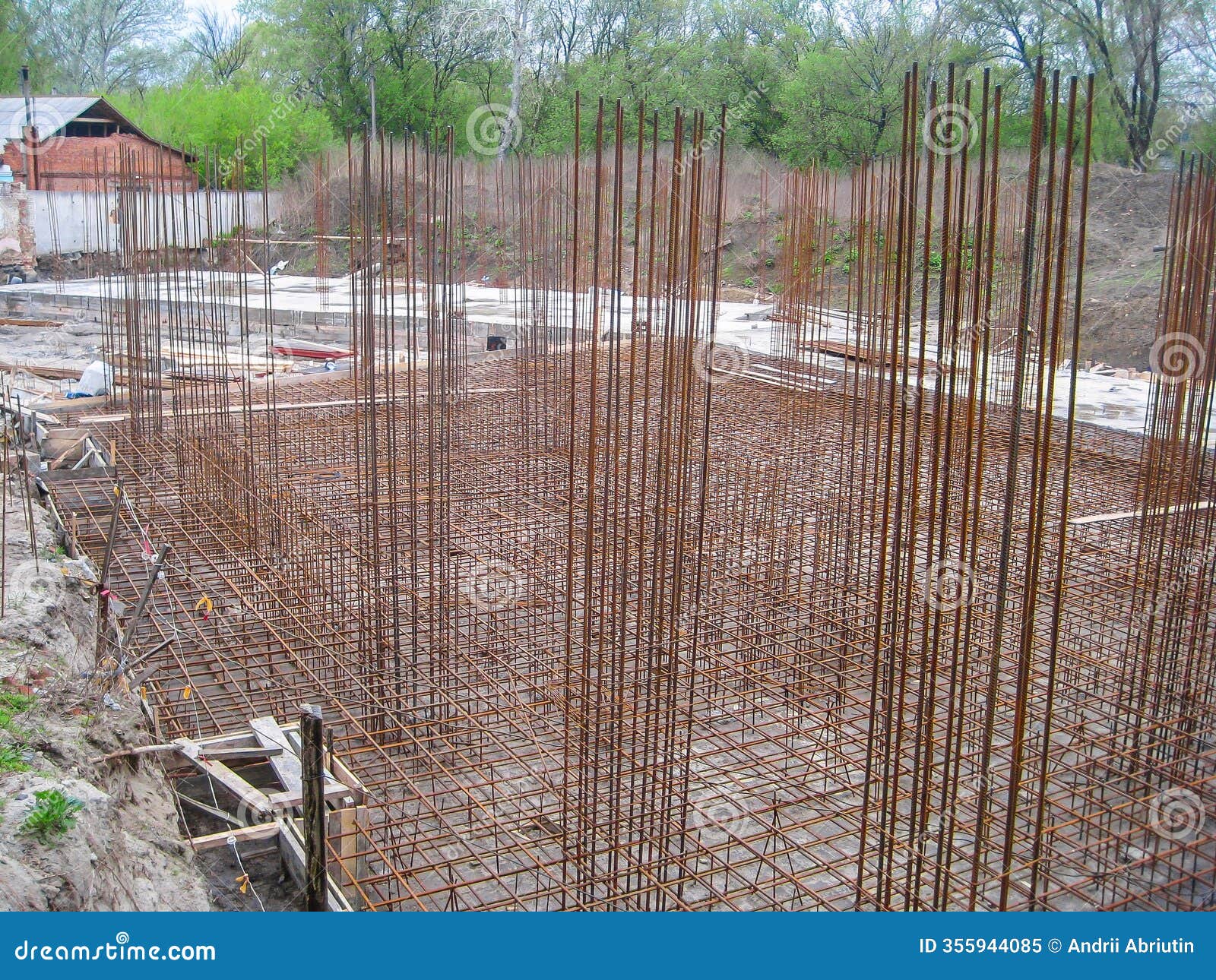 Construction Site with Reinforced Foundation Slab and Column Rebar ...
