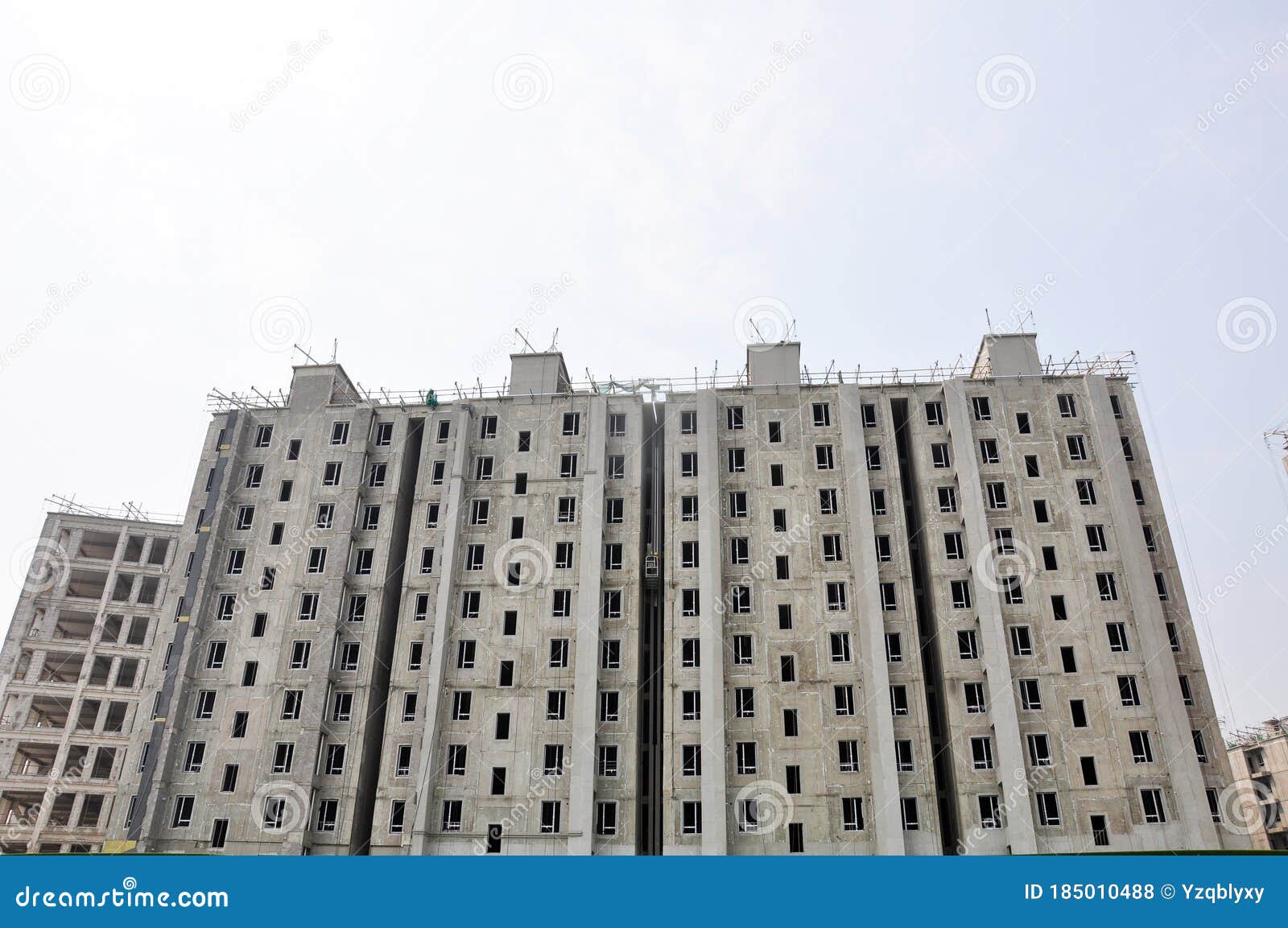 Real Estate Construction Site of Rough Building Under Construction with ...