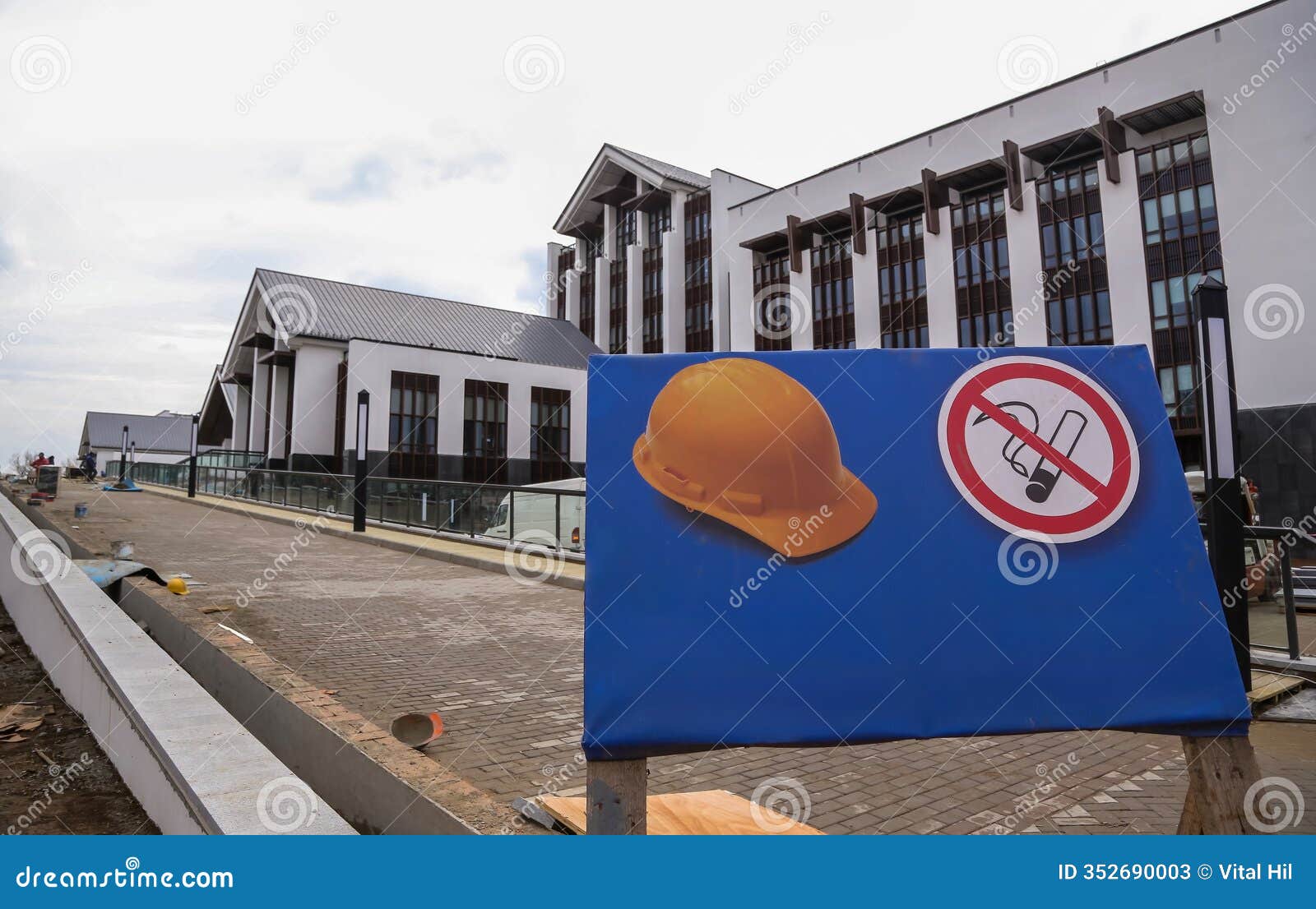 Construction Site Safety Sign Near a Modern Building Under Development ...
