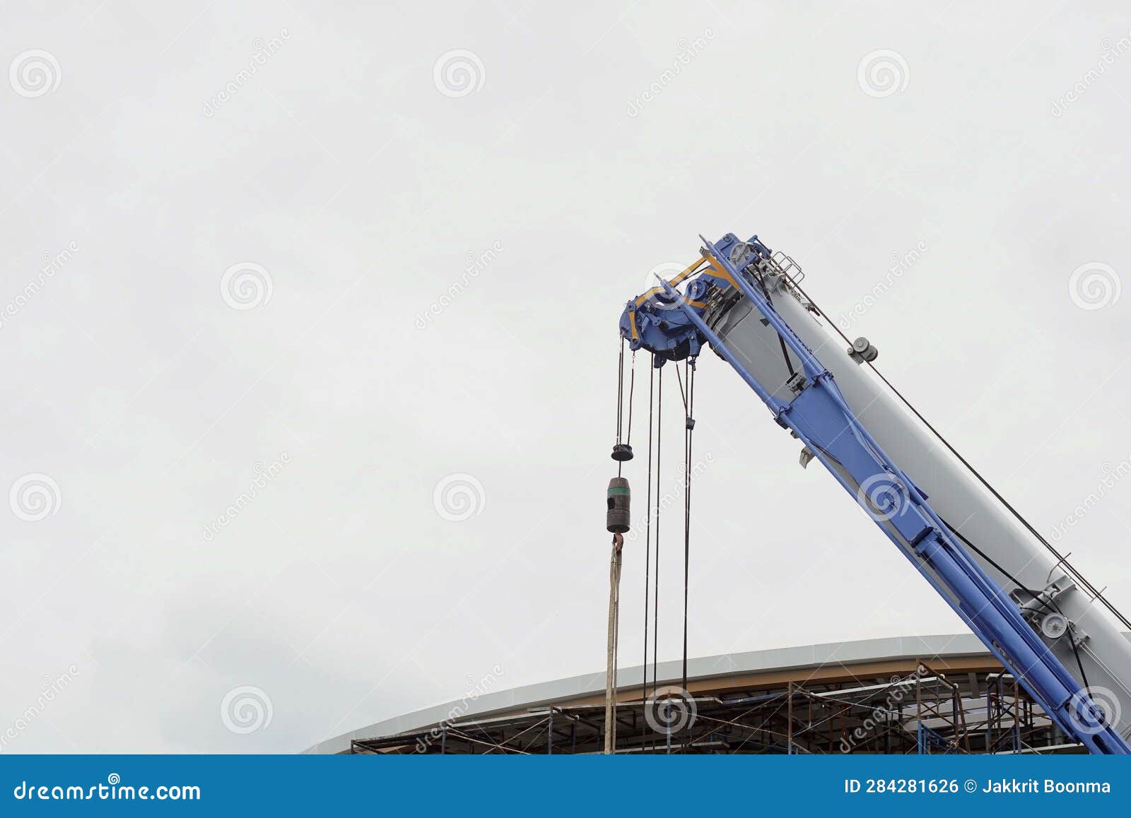 Construction Site with Scaffolding and Cranes for Moving of a Building ...