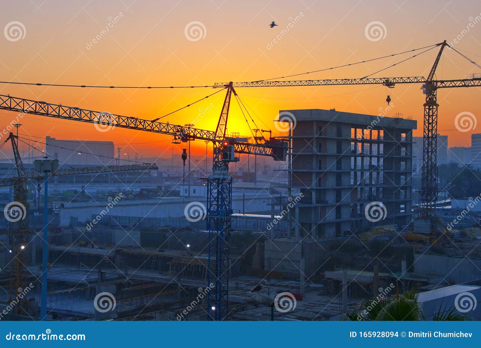 A Construction Site Scene with Cranes at Night Stock Photo - Image of ...