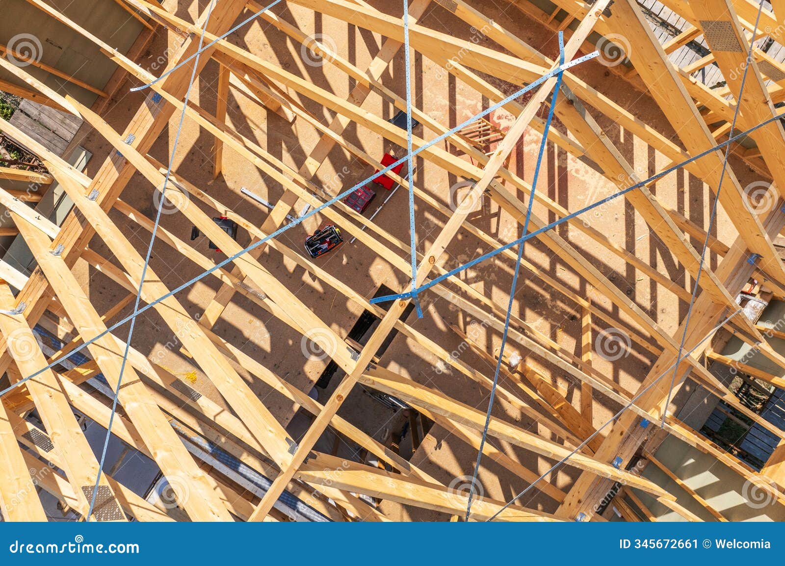 Construction Site Showing Wooden Beams and Framework during Sunny ...