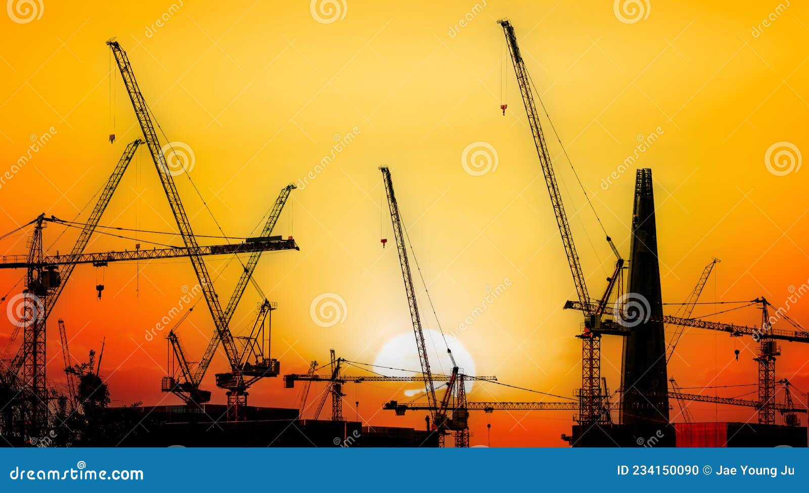 Construction Site with Sunrise or Sunset and Many Tower Cranes Stock ...