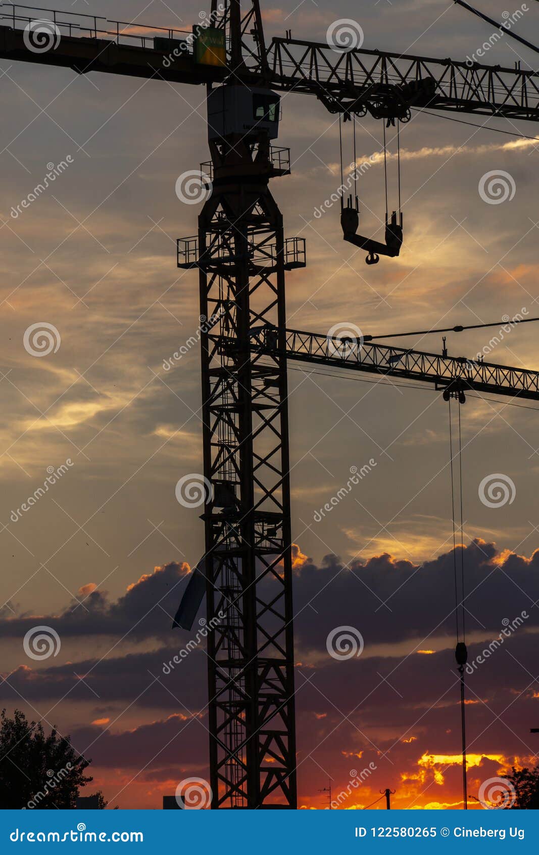 Construction Cranes at Sunset Stock Image - Image of foundation, crane ...