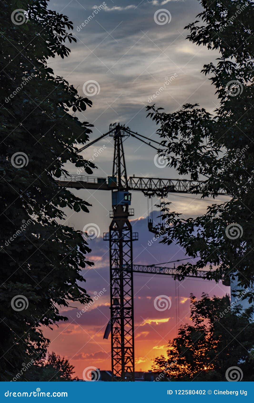 Construction Cranes at Sunset Stock Photo - Image of built ...
