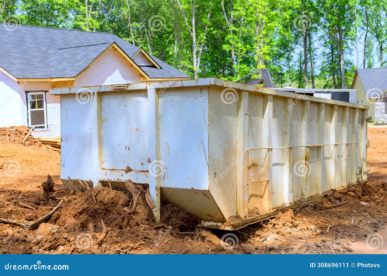 On Construction Site, There is a Metal Container Dumpster for Repair ...