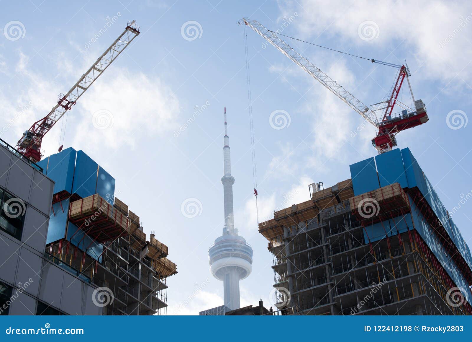 Toronto Construction Site with Two Cranes and CN Tower in the Middle ...