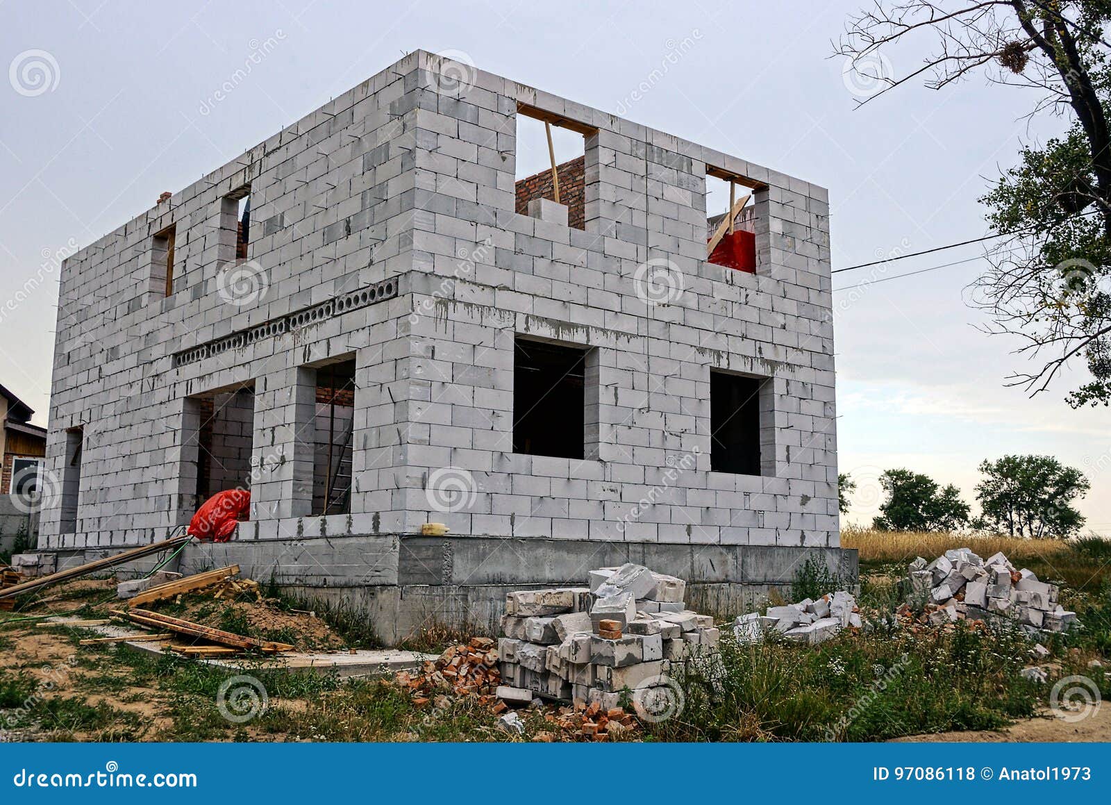 Construction Site with Unfinished House of White Brick Stock Photo ...