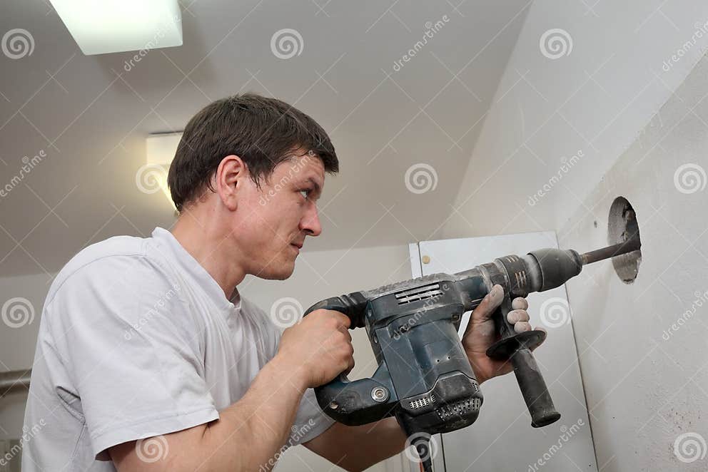 Construction Site, Wall Demolishing with Electric Plugger Stock Photo ...