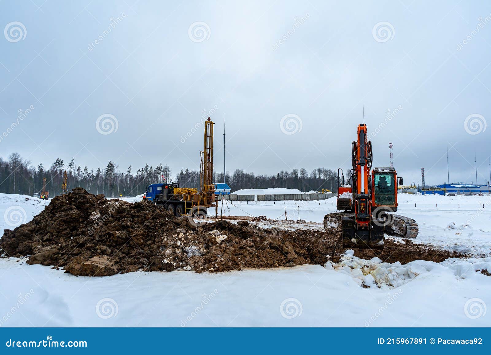 Construction Site in Winter with Various Construction Equipment ...