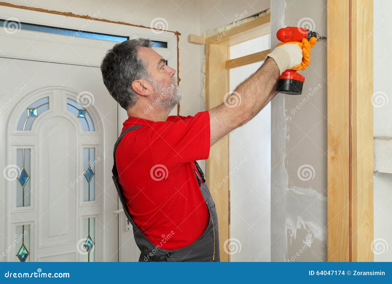 Construction Site, Worker Installing Gypsum Board Using Electric Stock ...