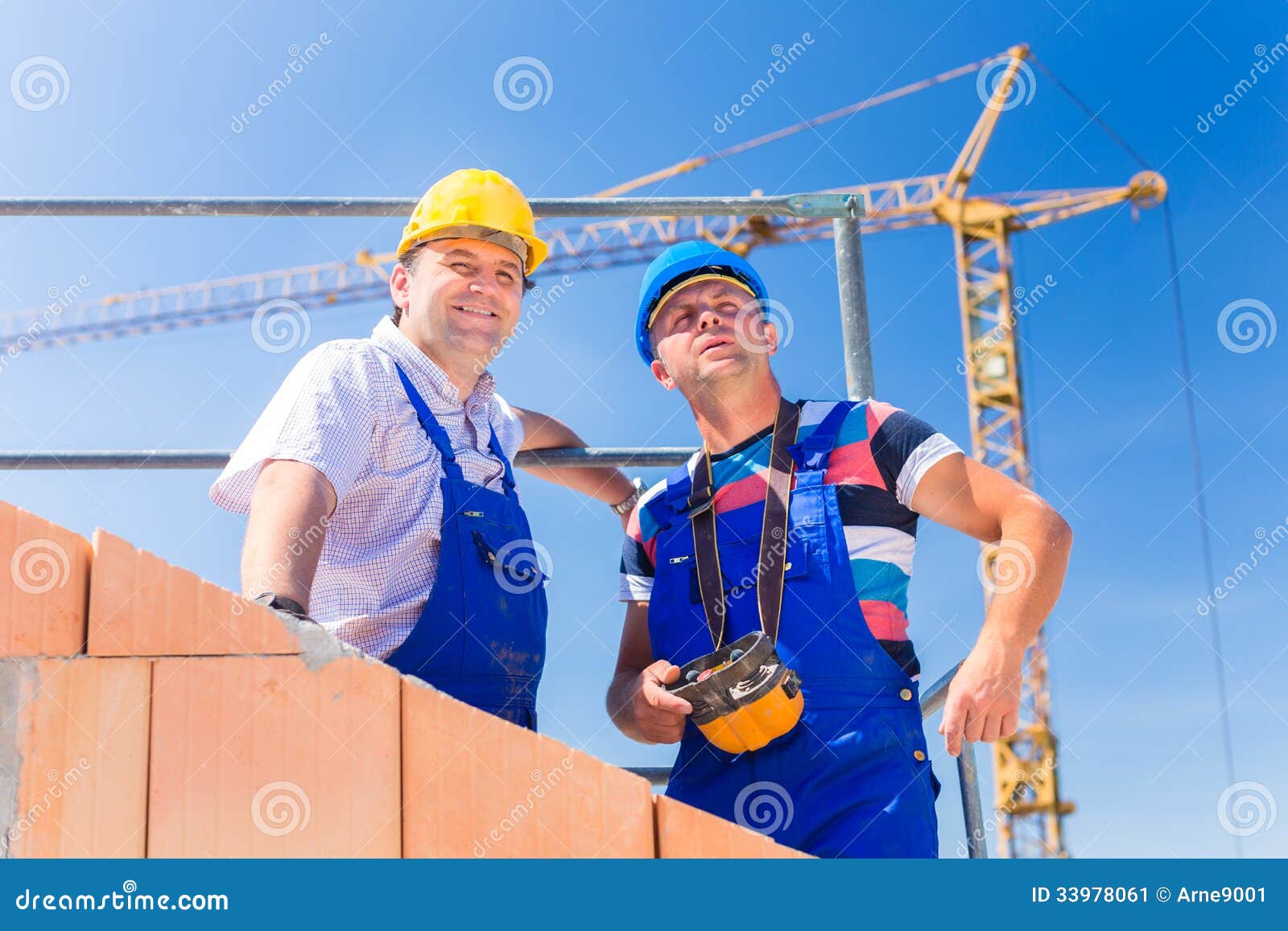Construction Site Workers Building House with Crane Stock Image - Image ...