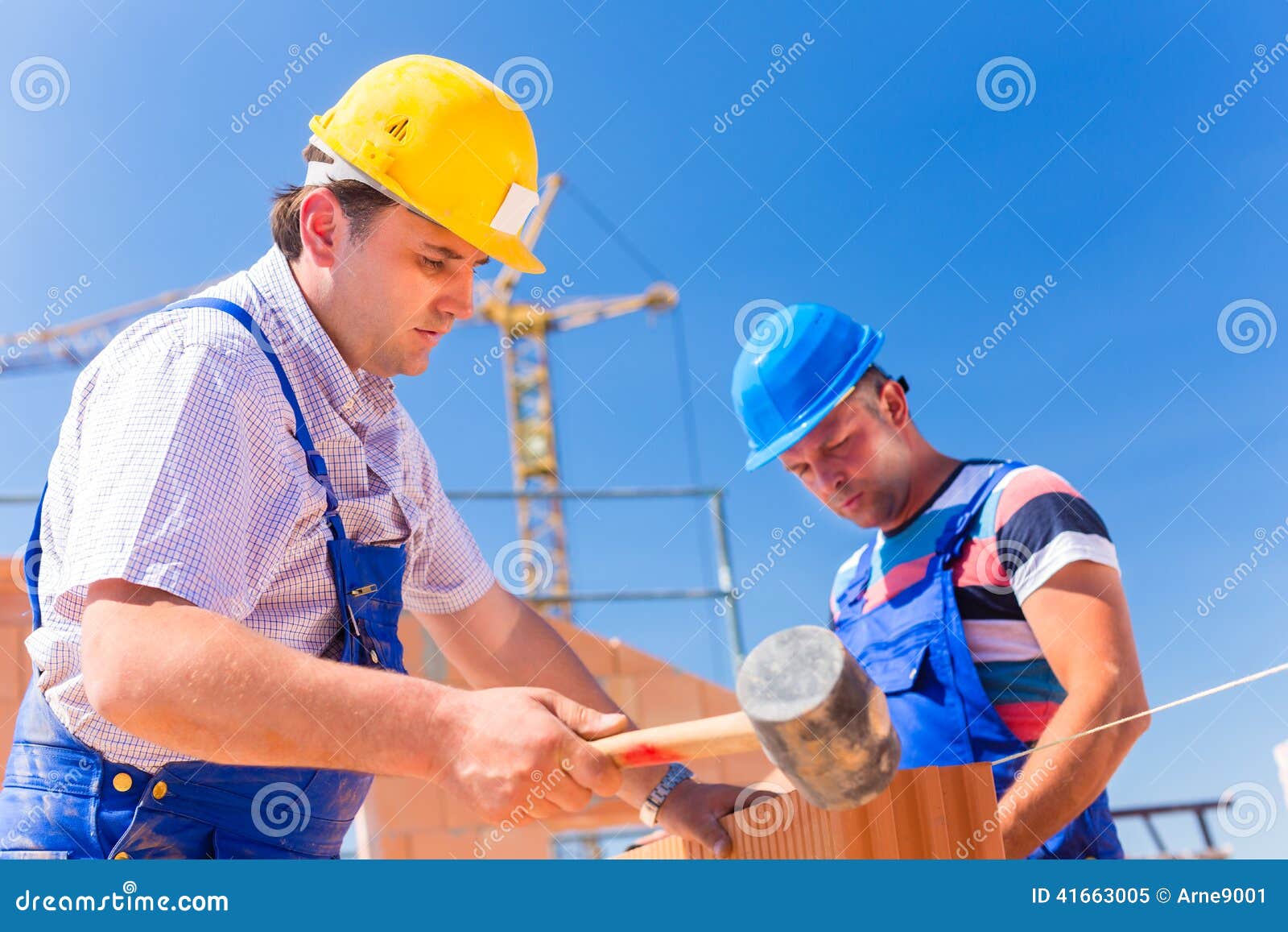 Construction Site Workers Building Walls on House Stock Image - Image ...