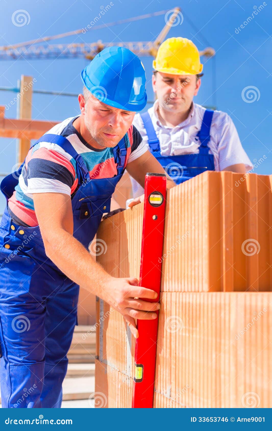 Construction Site Workers Checking Building Shell Stock Photo - Image ...