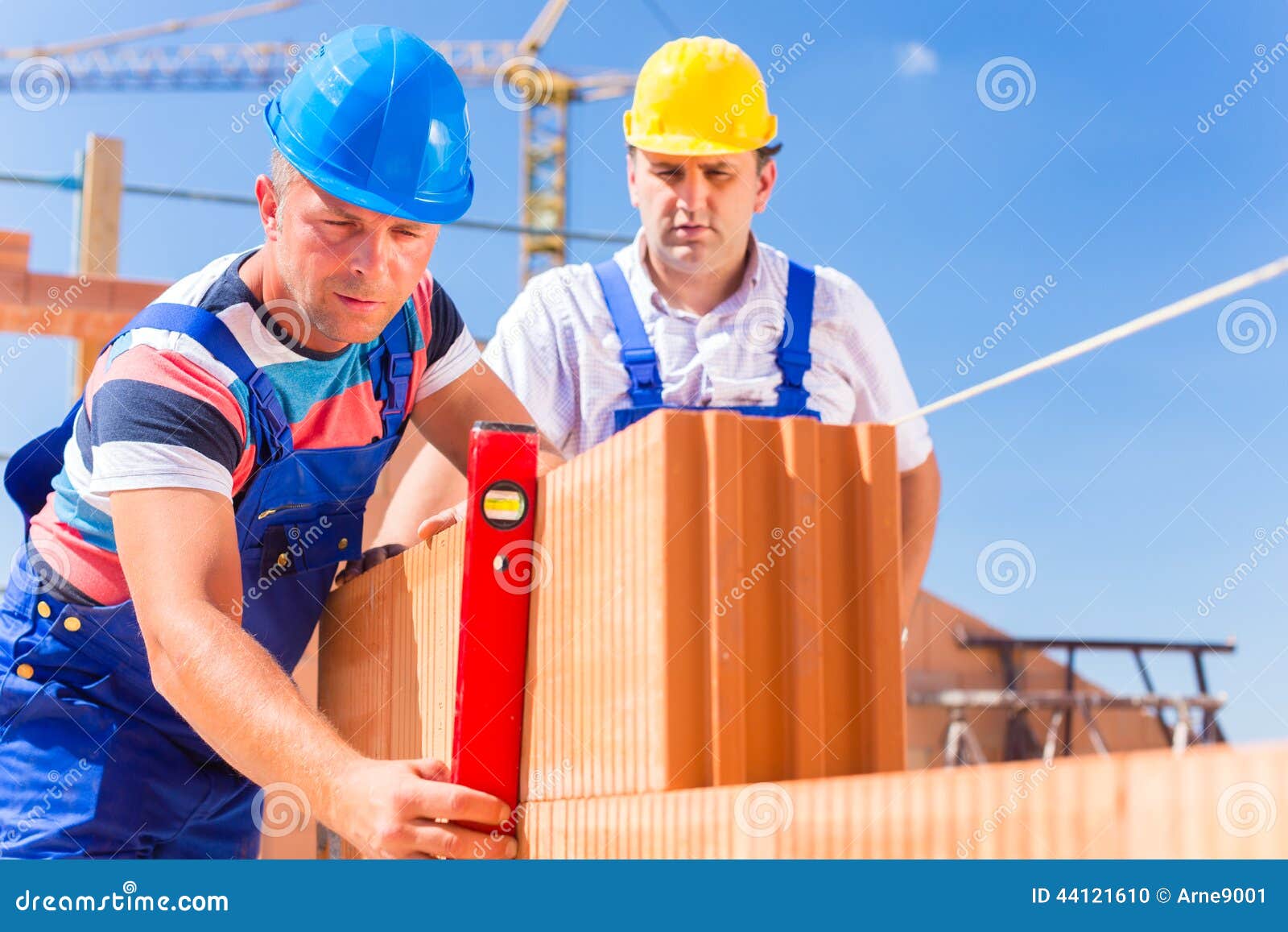 Construction Site Workers Checking Building Shell Stock Photo - Image ...