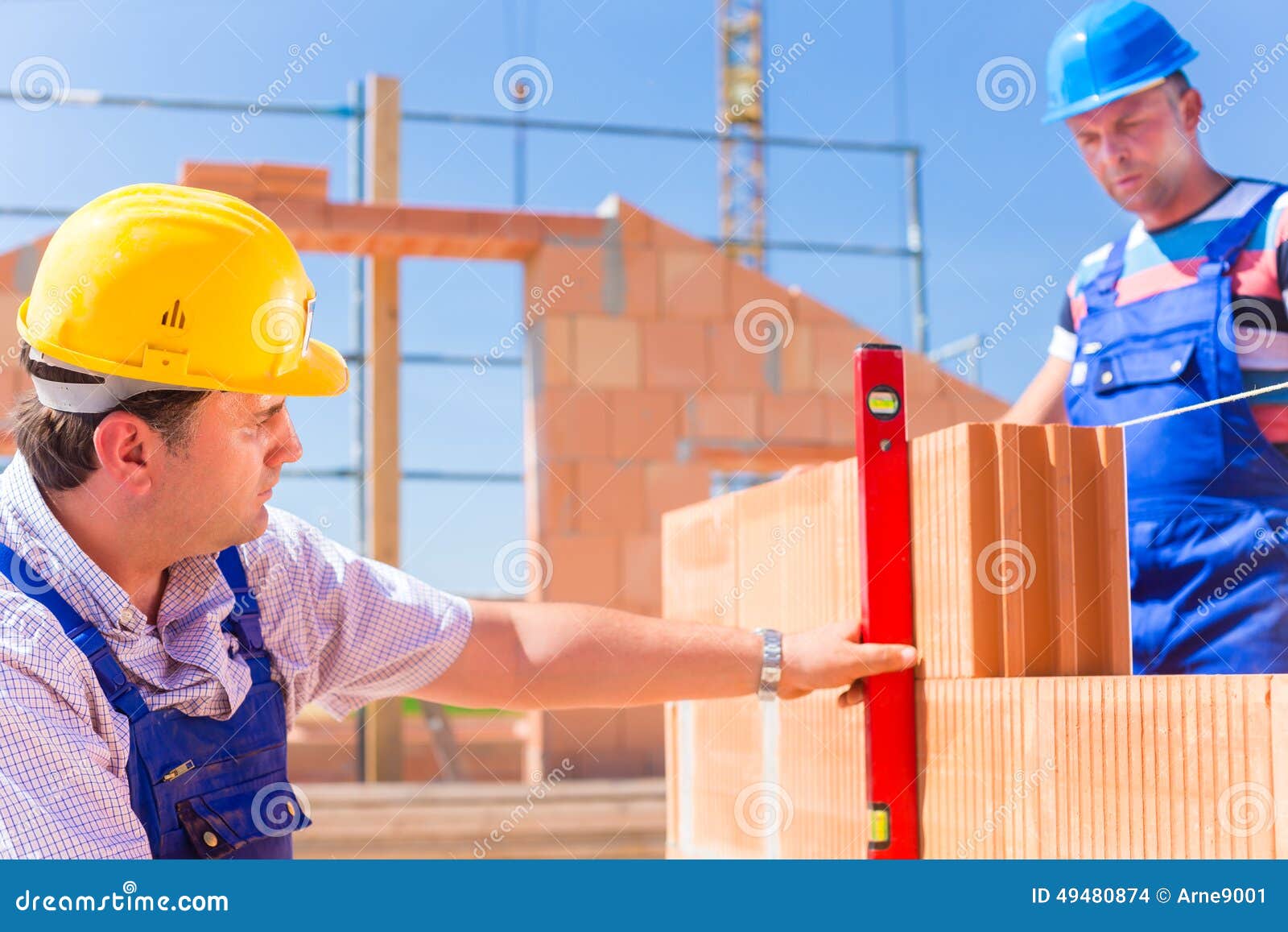 Construction Site Workers Checking Building Shell Stock Photo - Image ...