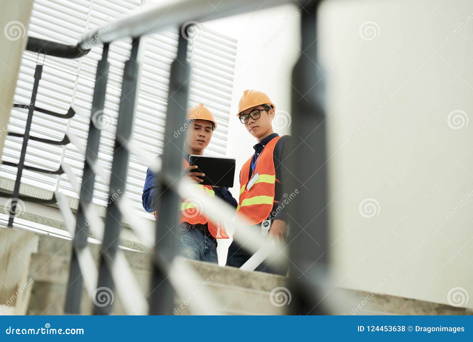 Construction Engineers Discussing Work Stock Photo - Image of coworker ...
