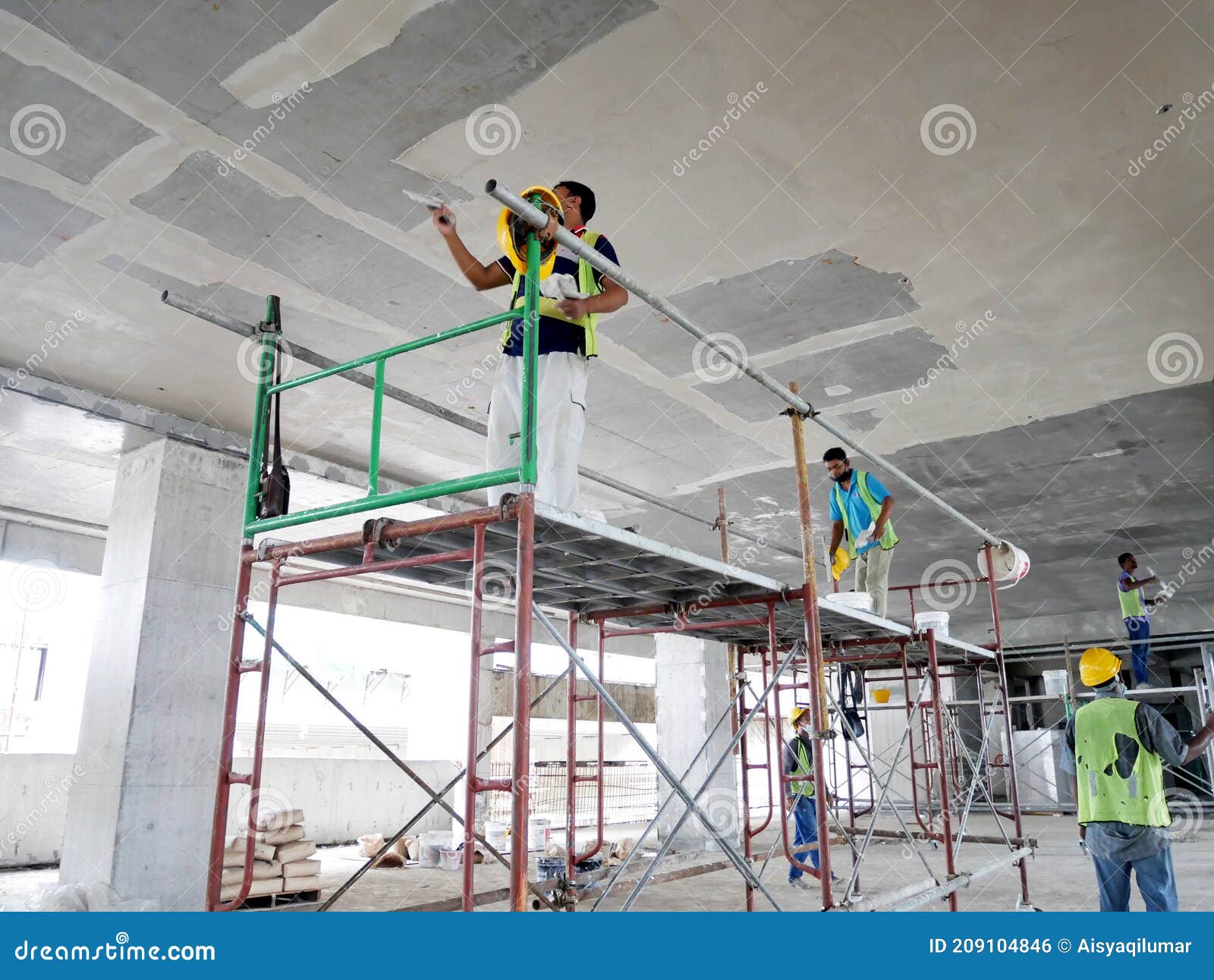 Construction Site Workers are Doing Ceiling Soffit Skim Coat Work at ...
