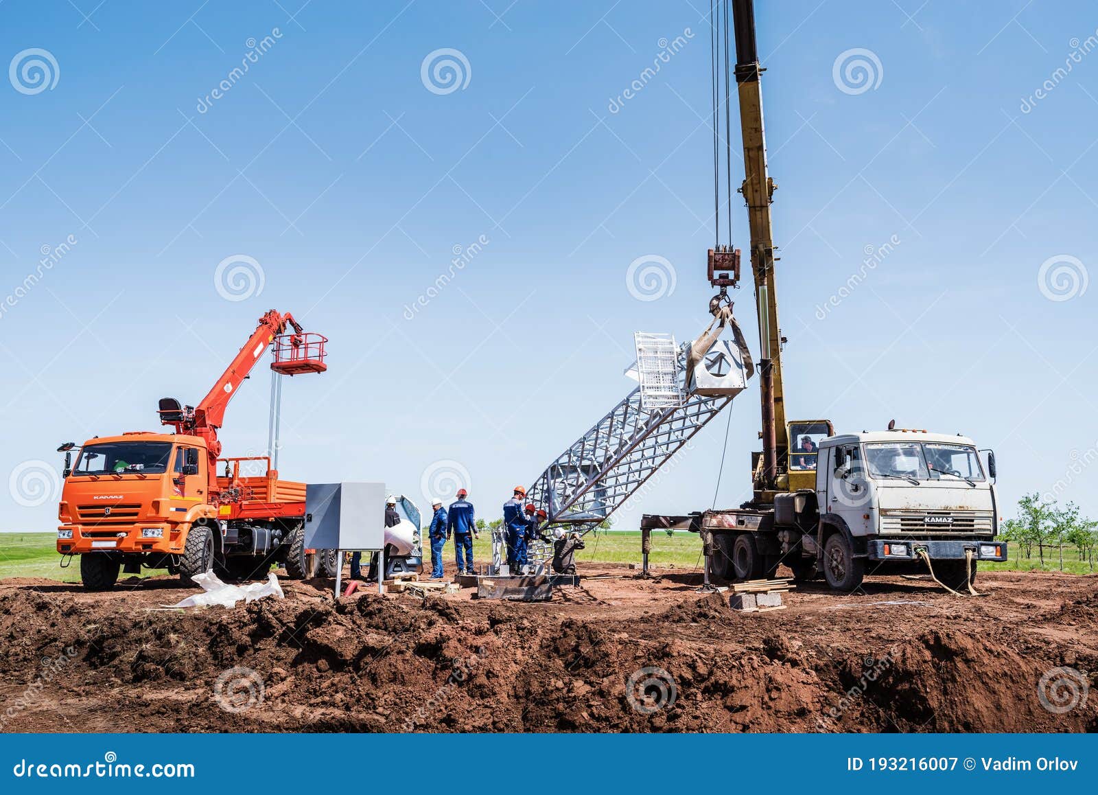 Construction Site, Workers Using Construction Equipment Install a Wind ...