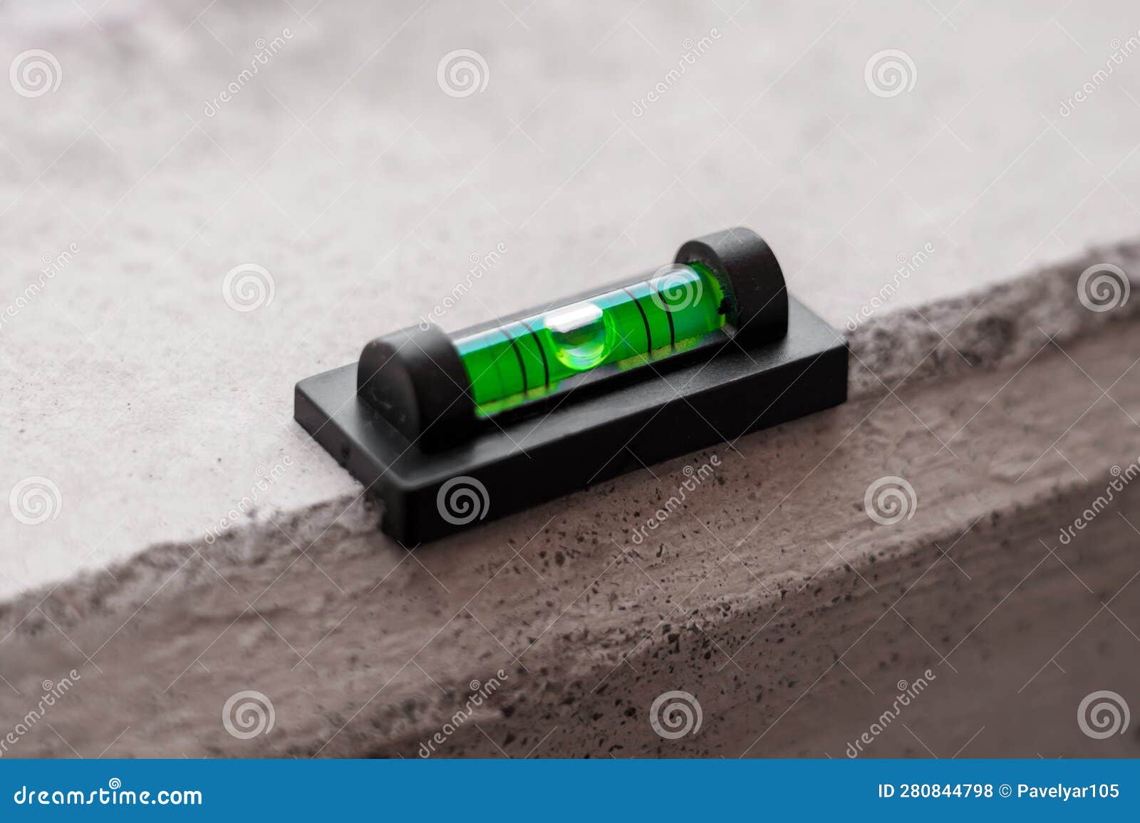 Construction Spirit Level Tool with Green Bubble on a Concrete Stock ...