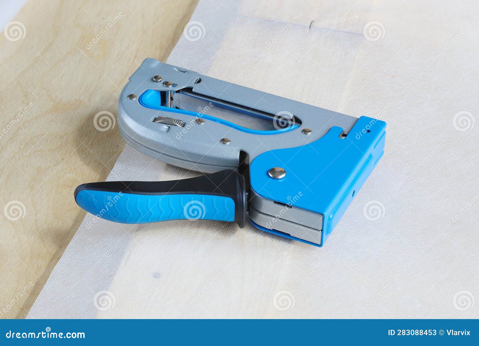 Construction Stapler is on Surface of Material Stock Image - Image of ...