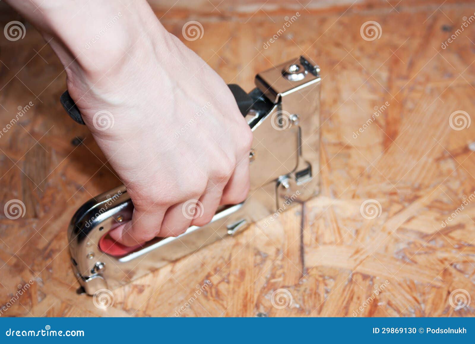 Construction Stapler in Hand Stock Photo - Image of logs, industry ...