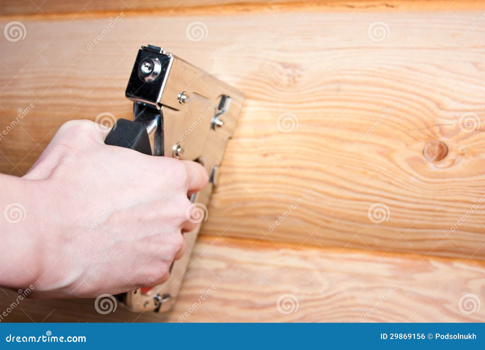 Construction Stapler in Hand Stock Photo - Image of person, logs: 29869156
