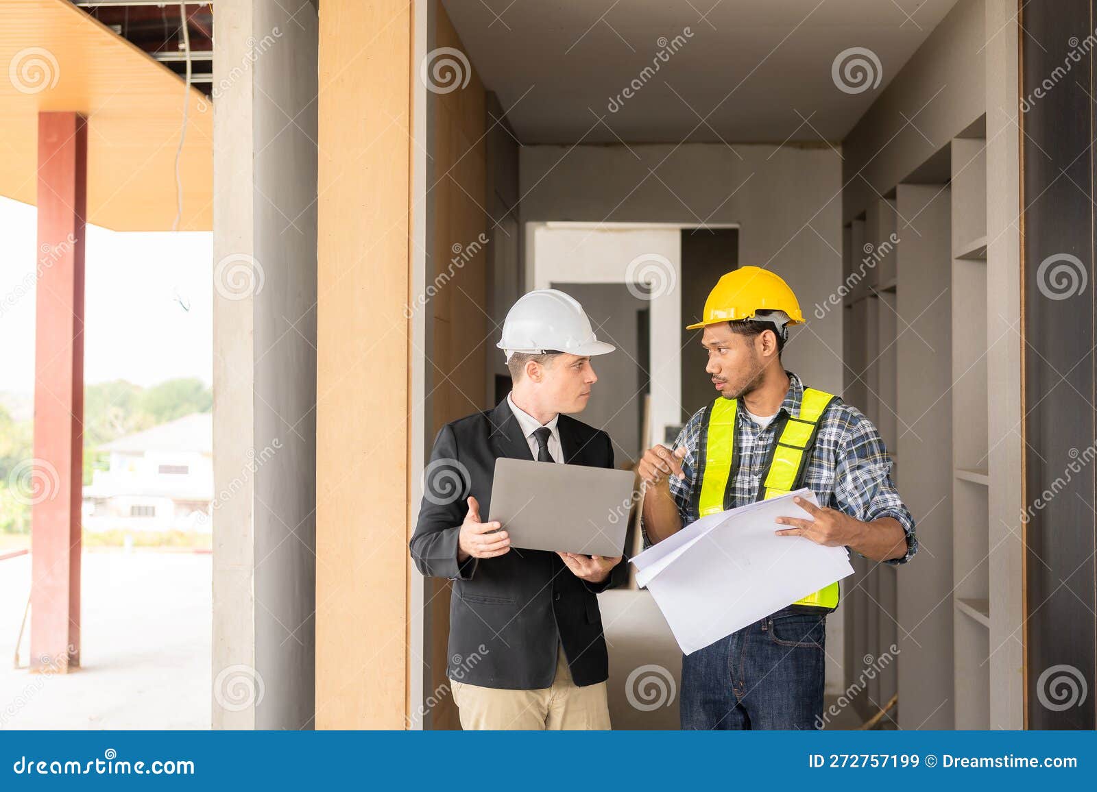 Construction and Structural Concept Engineers Working on Drawings at ...