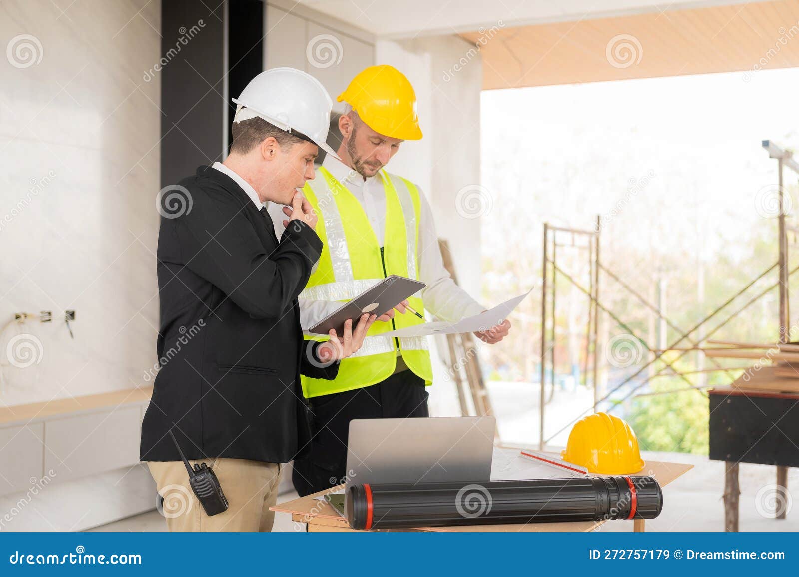 Construction and Structural Concept Engineers Working on Drawings at ...