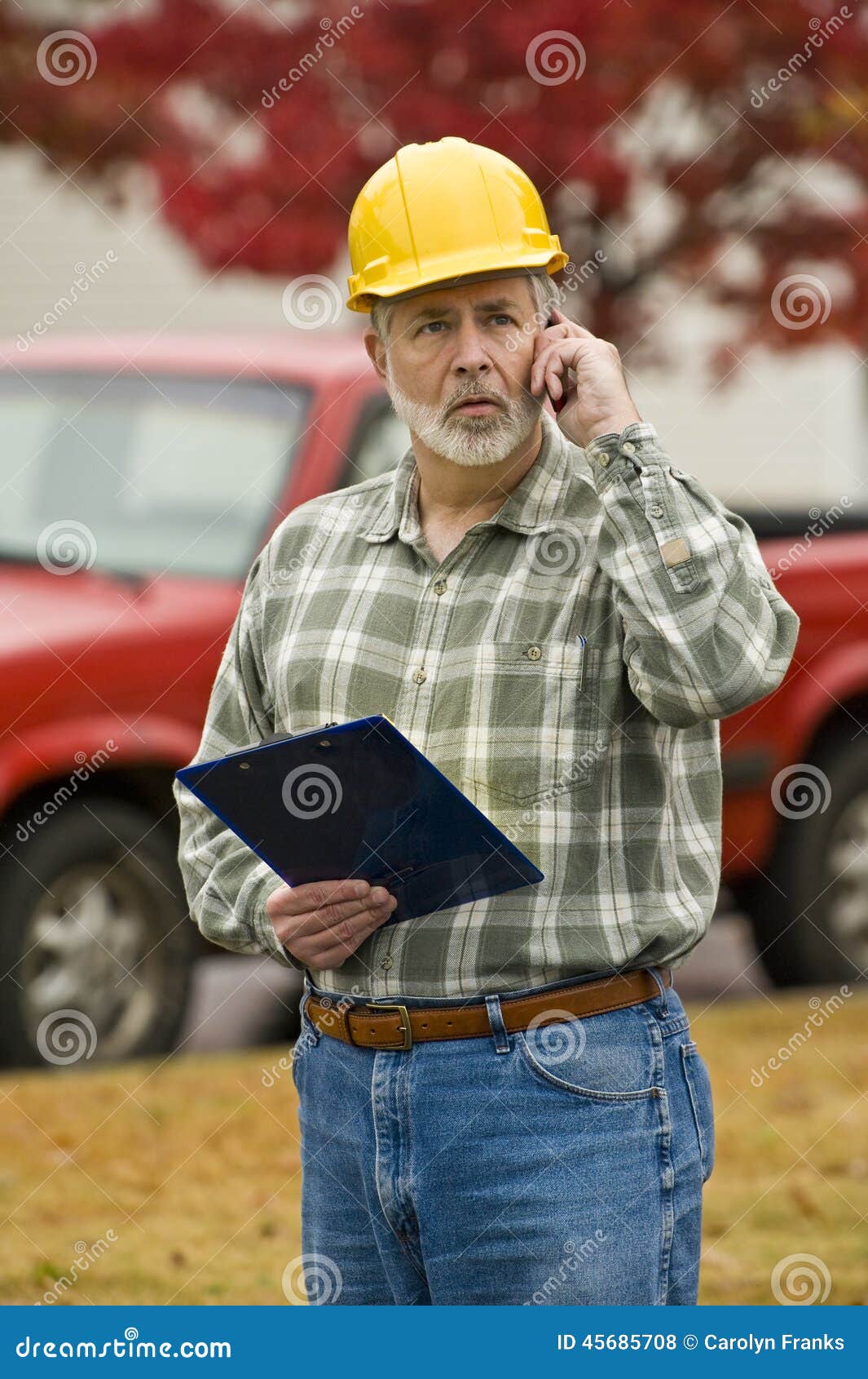 Construction Supervisor Makes Phone Call Stock Photo - Image of casual ...