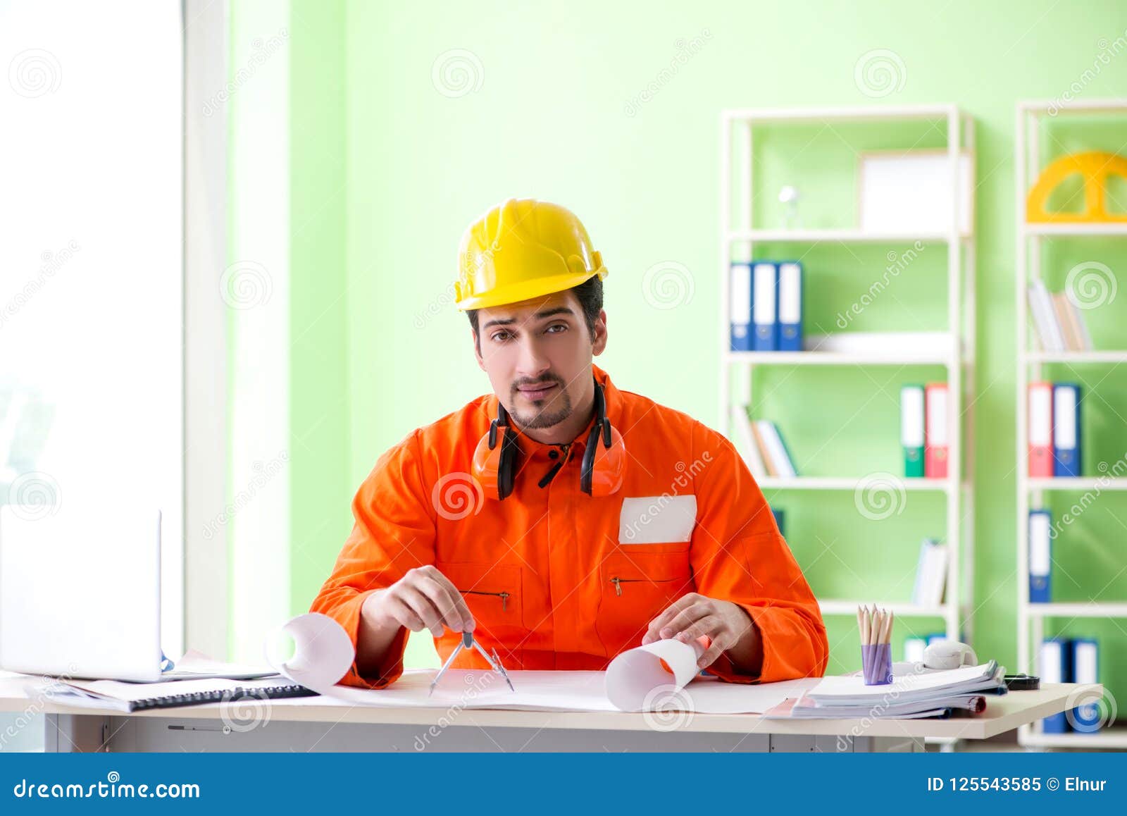 The Construction Supervisor Planning New Project in Office Stock Image ...