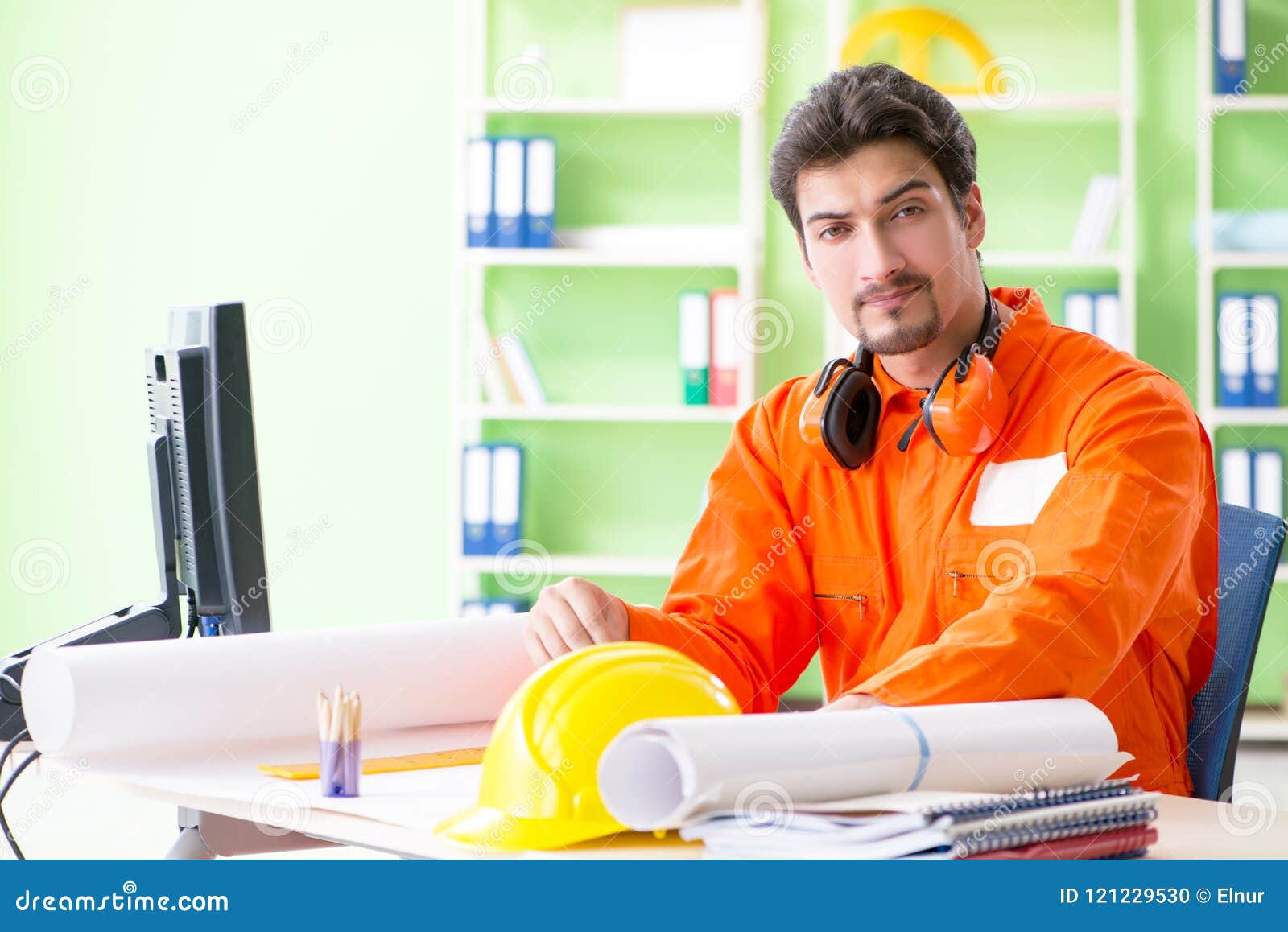 The Construction Supervisor Planning New Project in Office Stock Photo ...