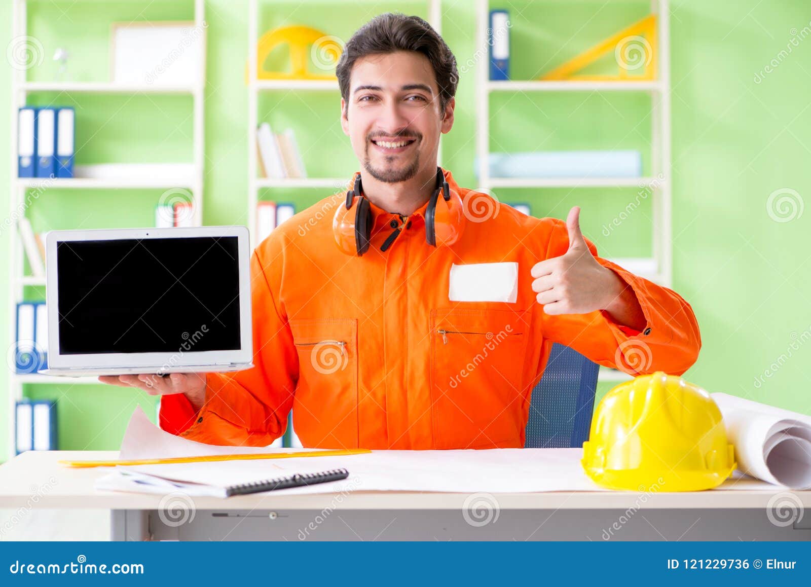 The Construction Supervisor Planning New Project in Office Stock Photo ...