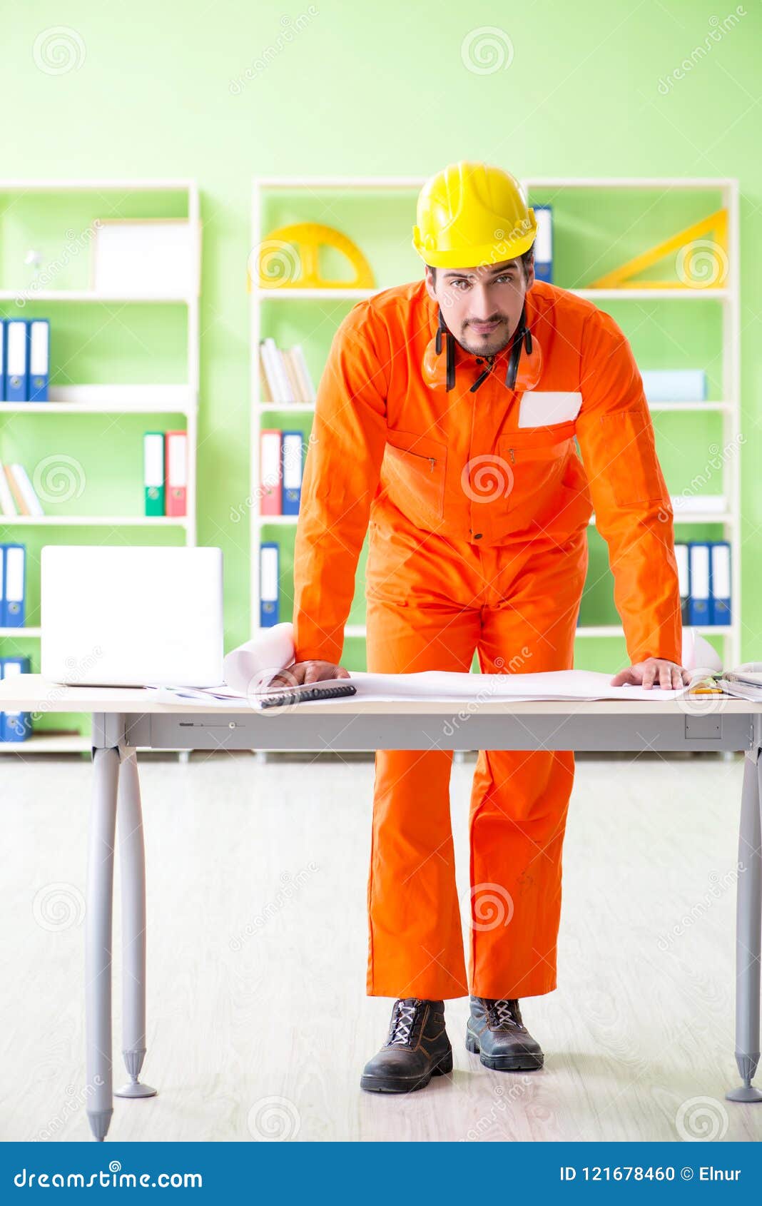 The Construction Supervisor Planning New Project in Office Stock Photo ...
