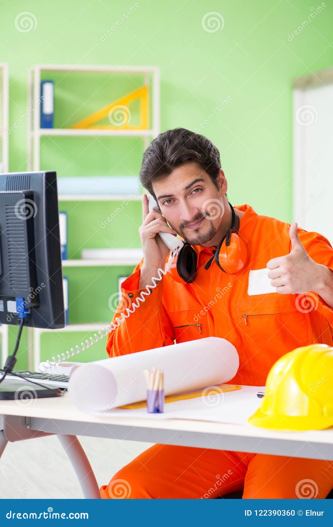 The Construction Supervisor Planning New Project in Office Stock Photo ...
