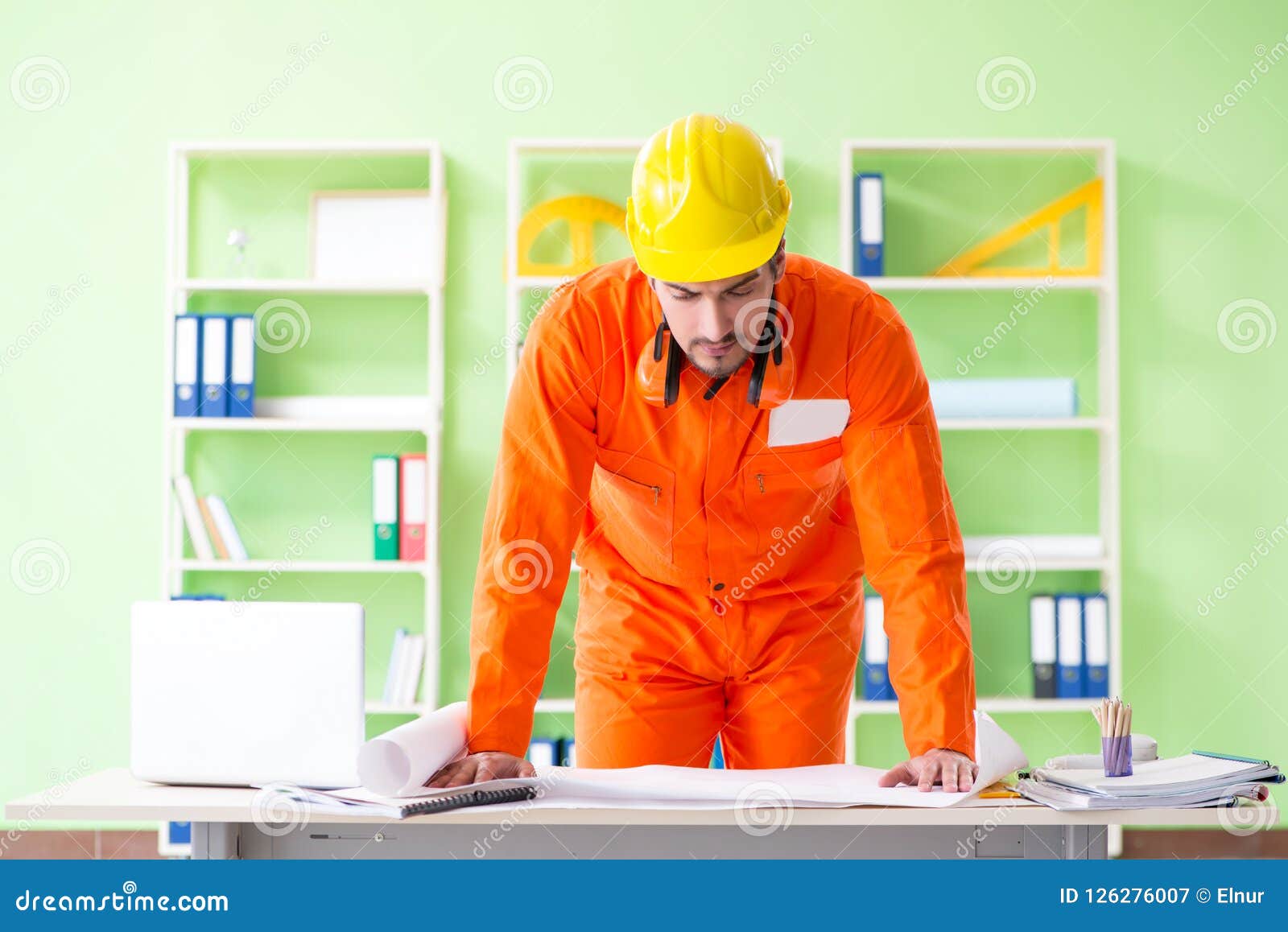The Construction Supervisor Planning New Project in Office Stock Image ...