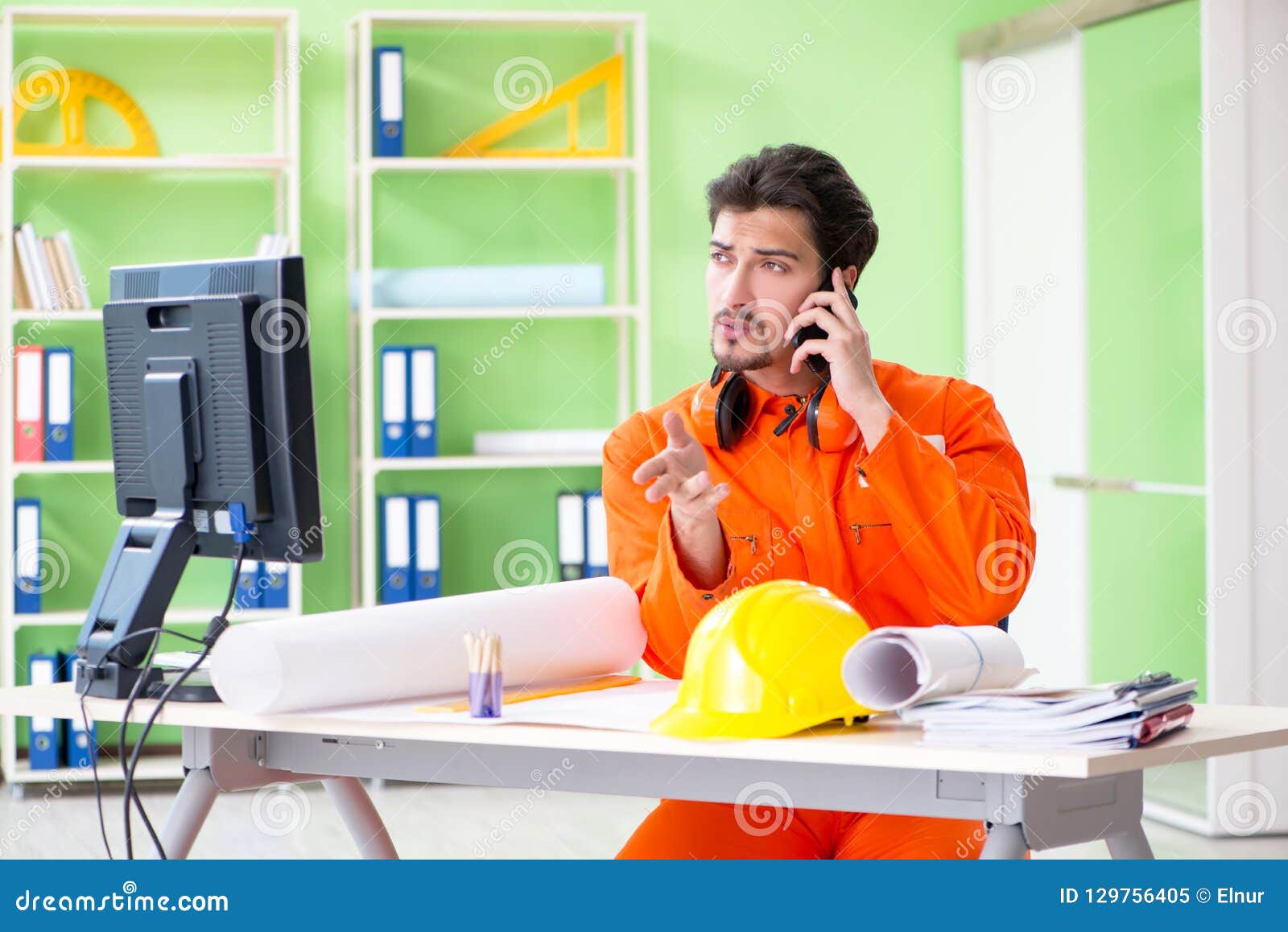The Construction Supervisor Planning New Project in Office Stock Image ...