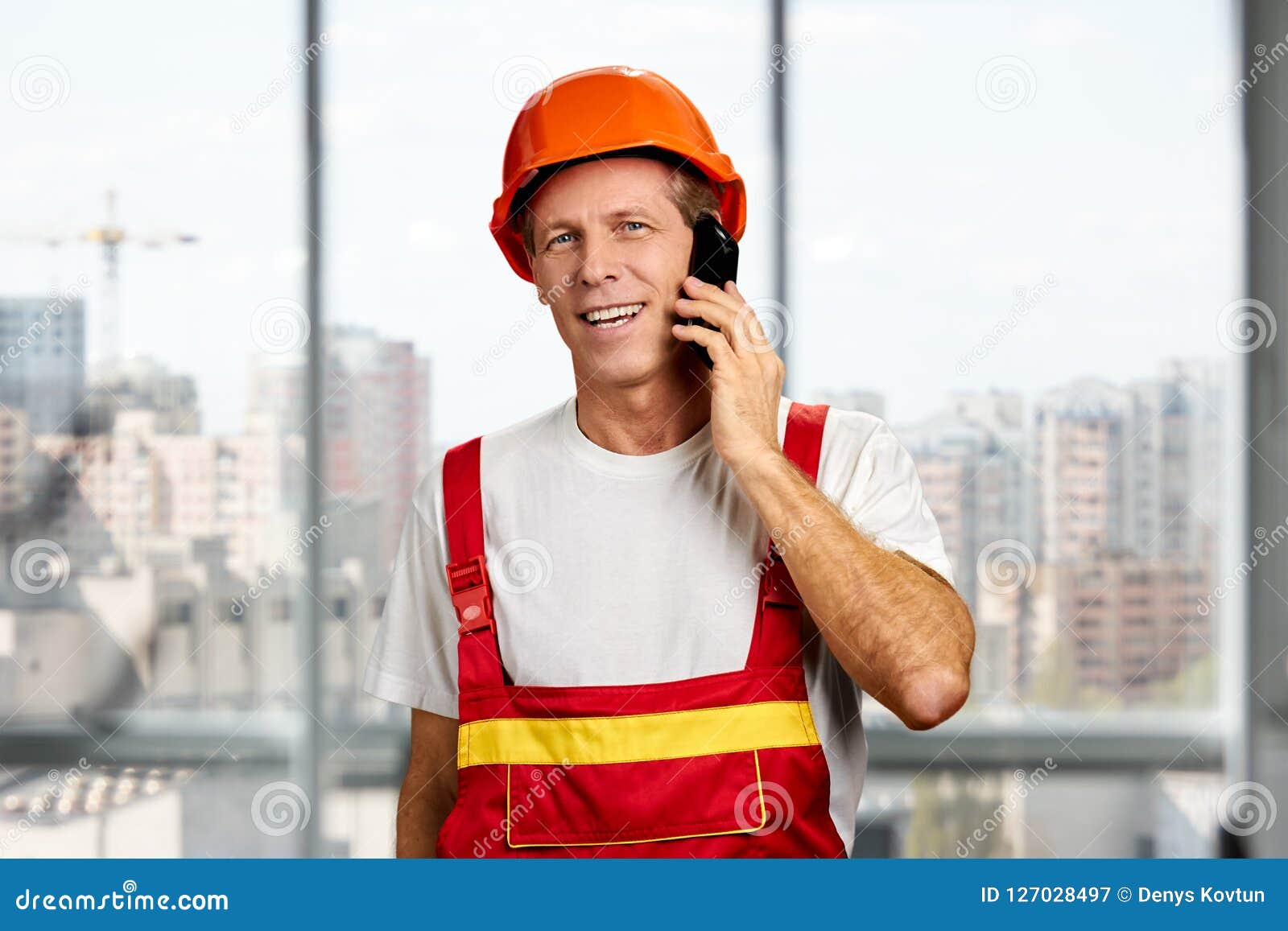 Construction Supervisor Talking on Cell Phone. Stock Image - Image of ...