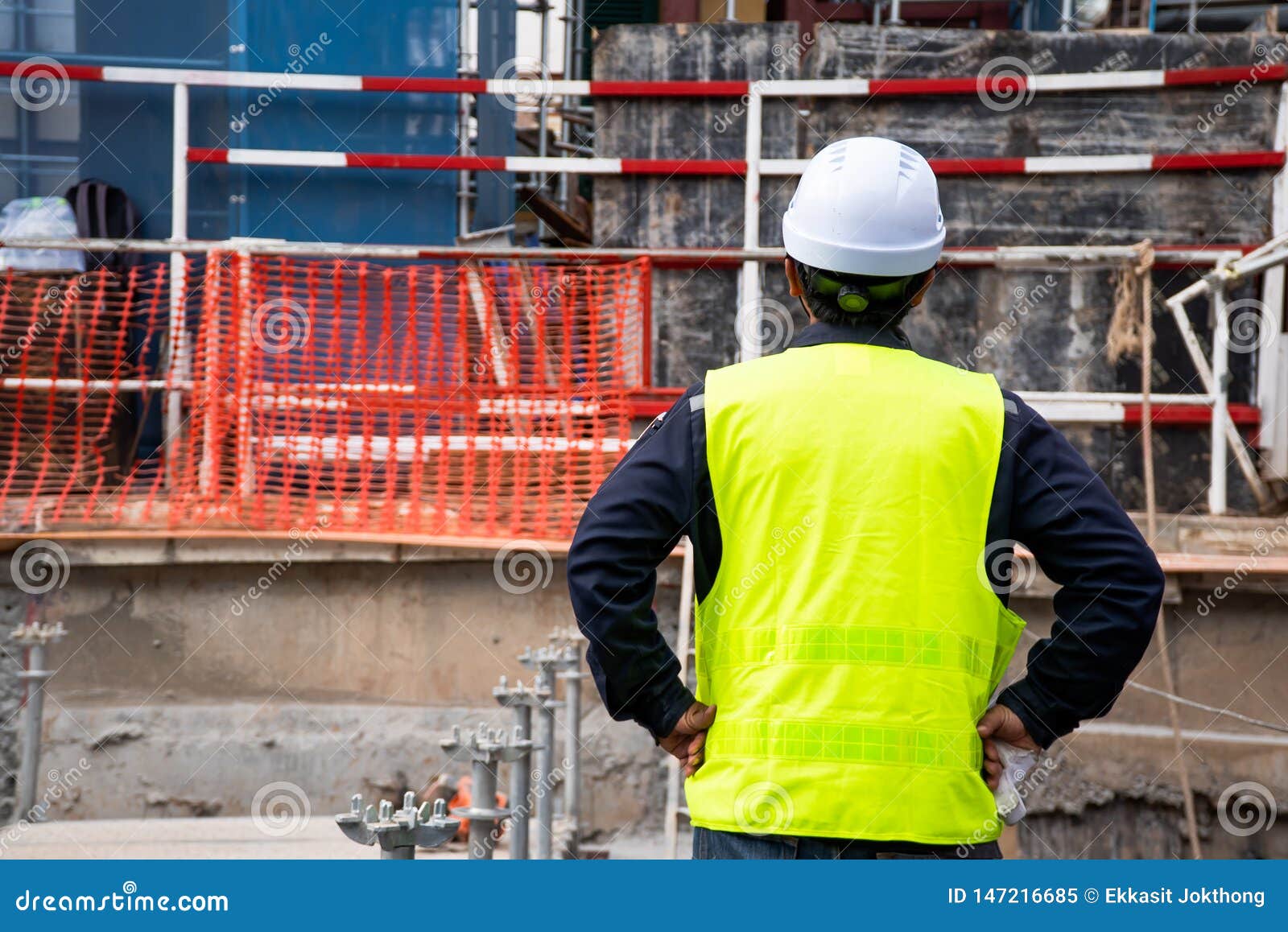 Construction Supervisor Wearing Green Safety Shirt Standing Back ...